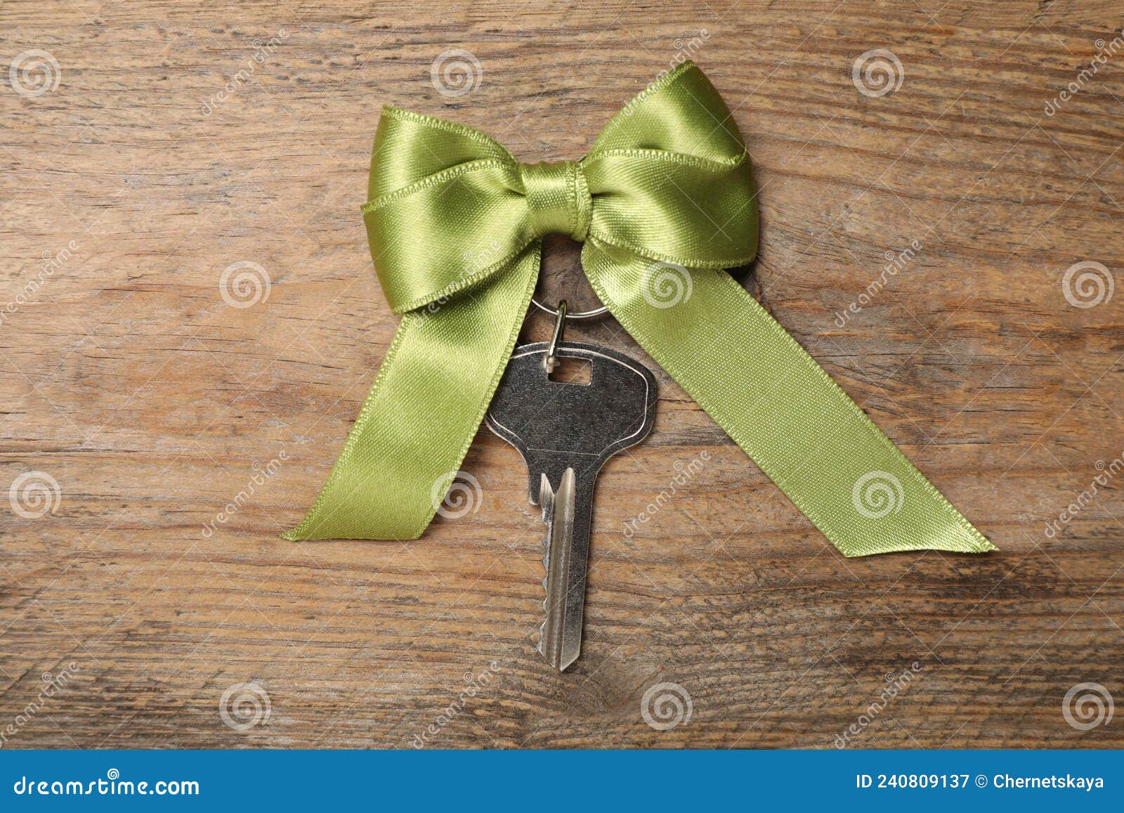 Key with Bow on Wooden Table, Top View. Housewarming Party Stock Image ...