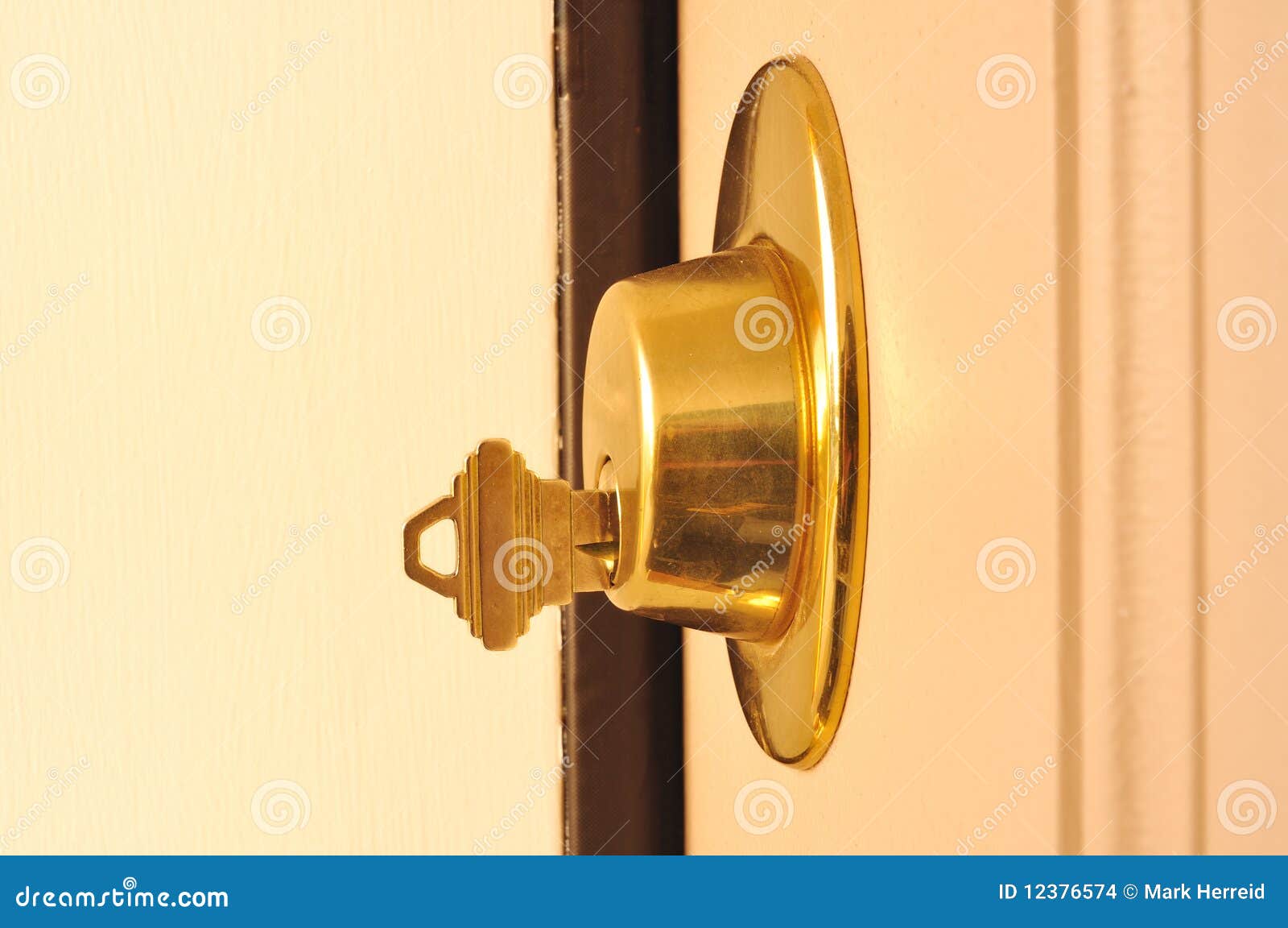 Key in a Dead Bolt Lock stock photo. Image of bolt, protection - 12376574