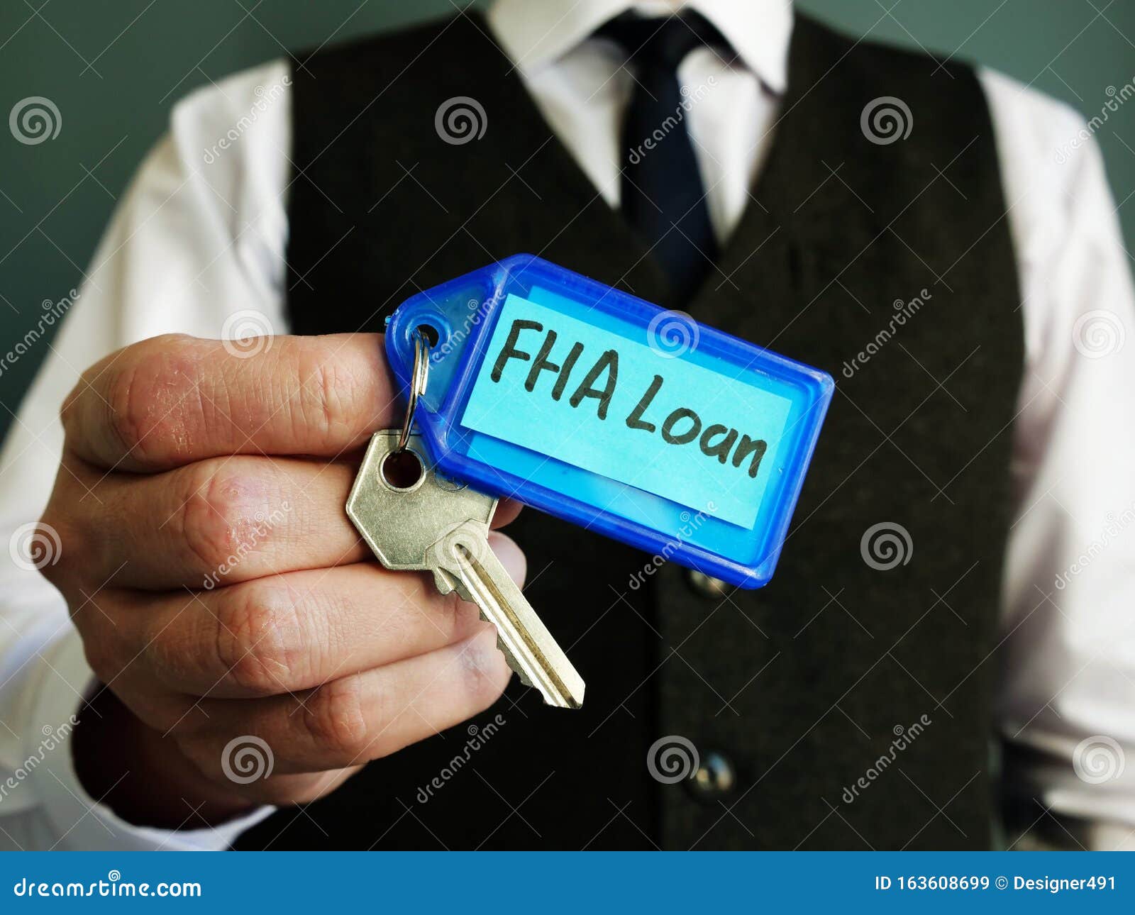 The Key with FHA Loan Sign is in the Hands Stock Image - Image of ...