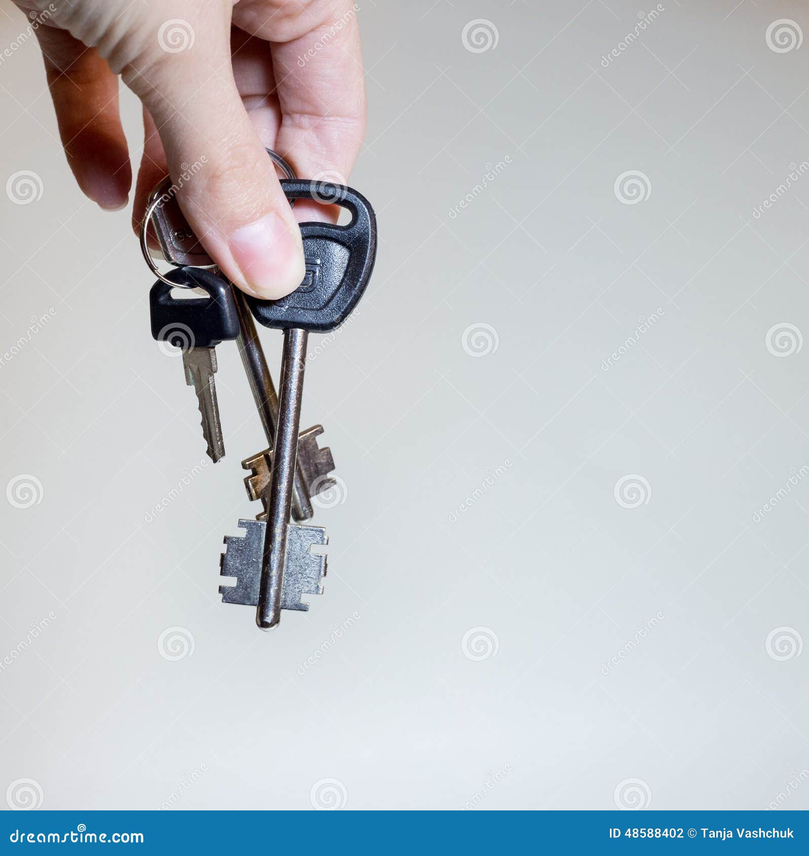 Key in the hand stock photo. Image of human, isolated - 48588402