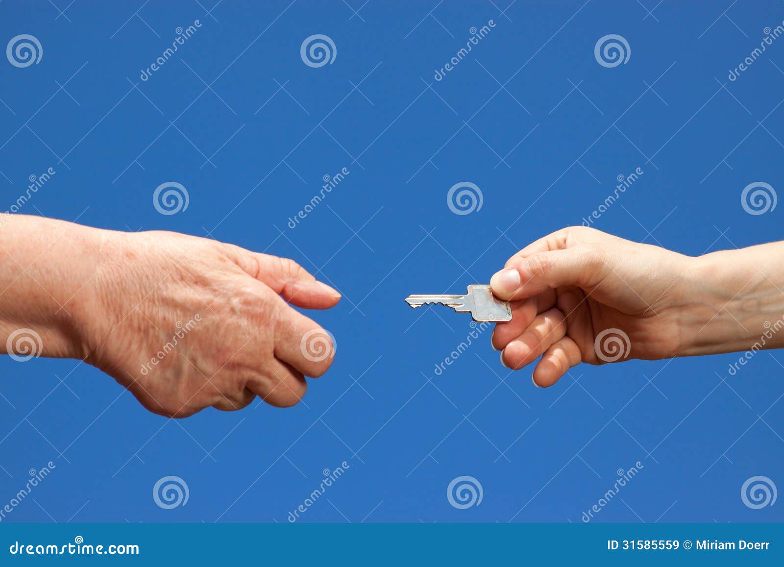 Key Handover From A Woman Hand To A Man Hand Royalty-Free Stock ...