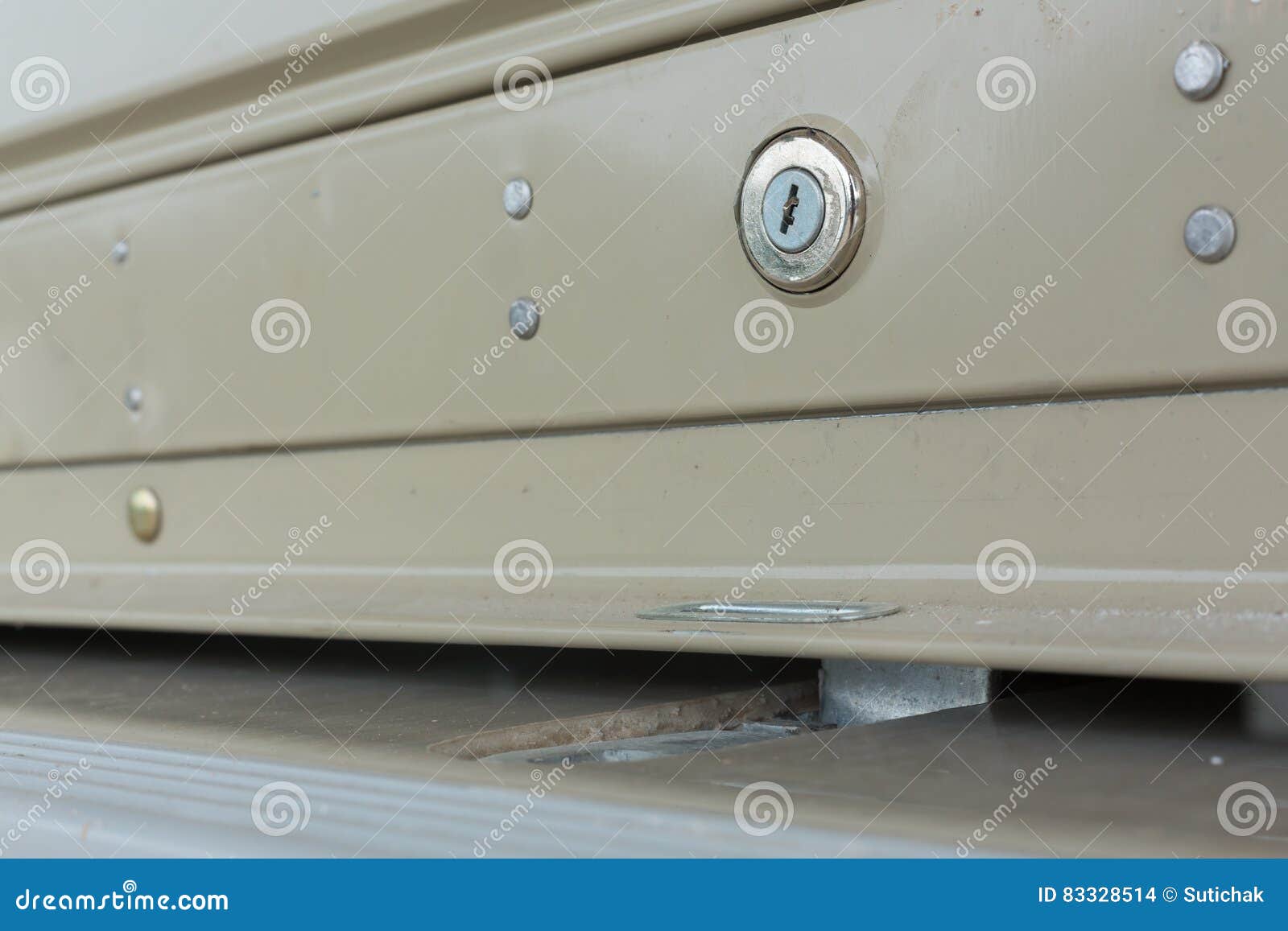 Key hole on shutter door stock photo. Image of safeguard - 83328514
