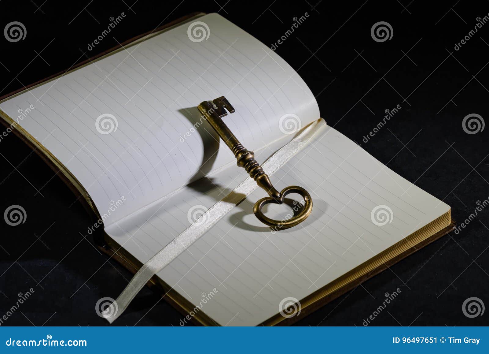 Key on journal or notebook stock image. Image of blank - 96497651