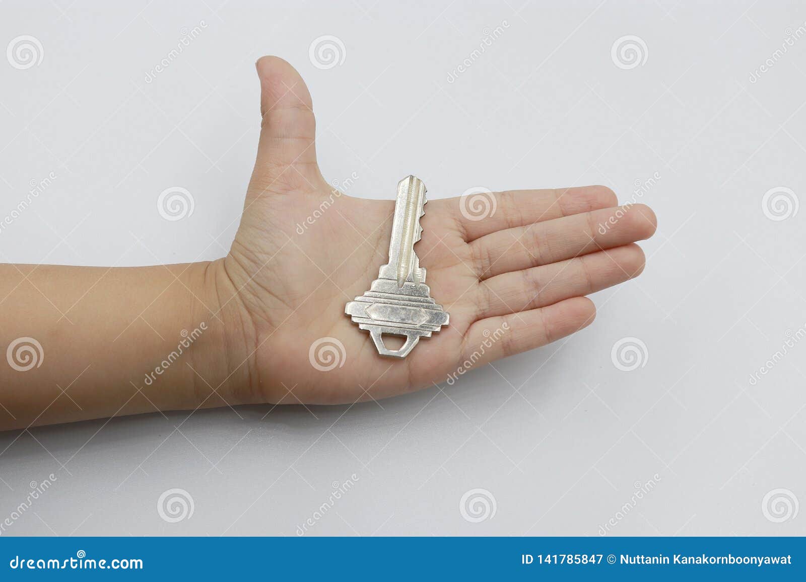 A Key in Kid Hand on White Background Stock Image - Image of object ...
