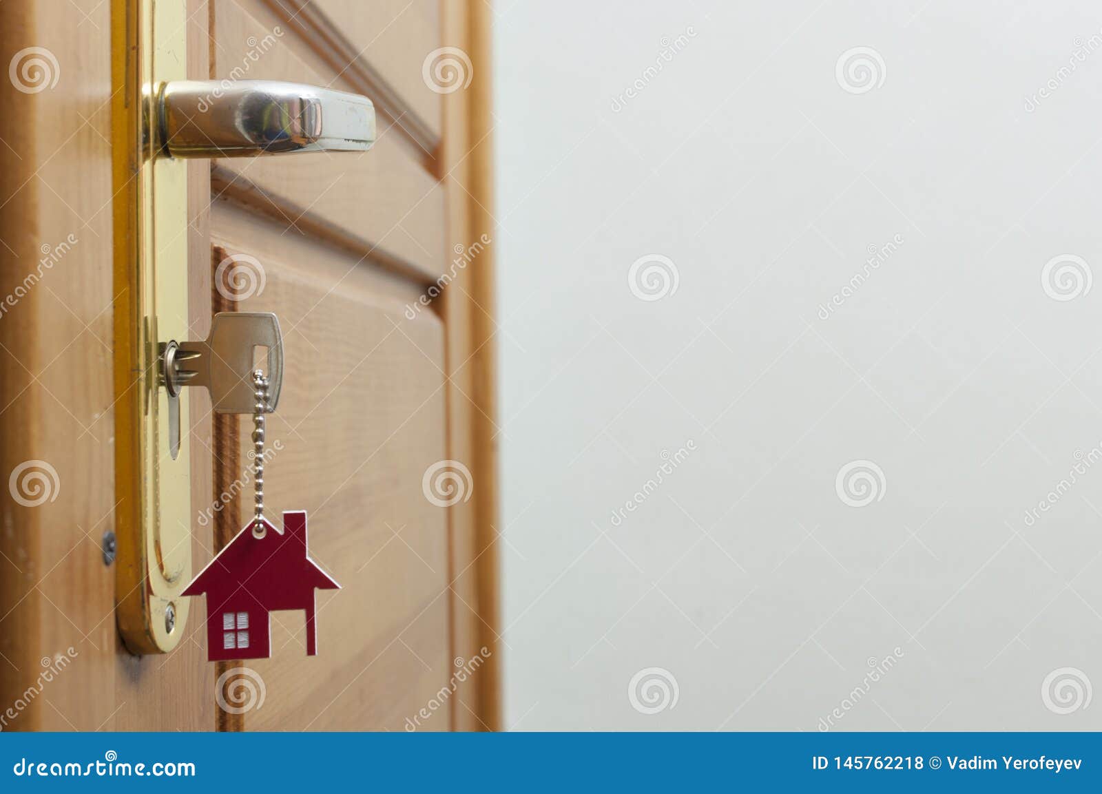 A Key in a Lock with House Icon on it Stock Photo - Image of symbol ...