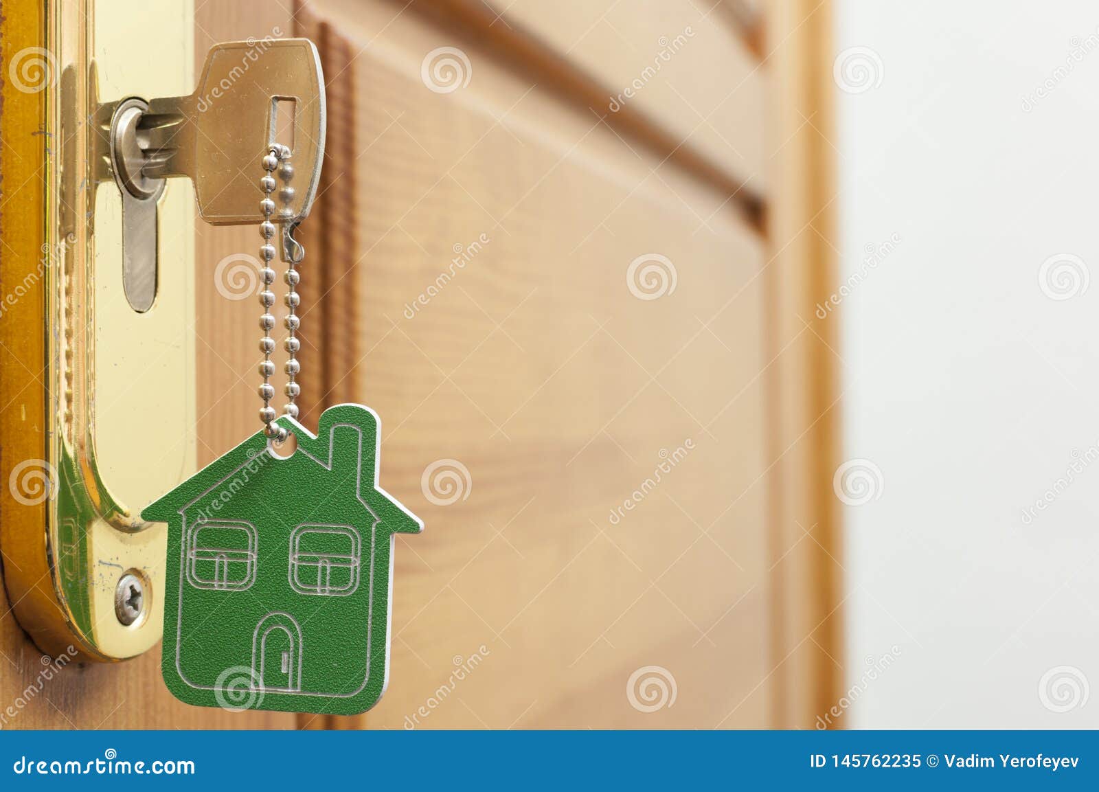 A Key in a Lock with House Icon on it Stock Image - Image of entrance ...