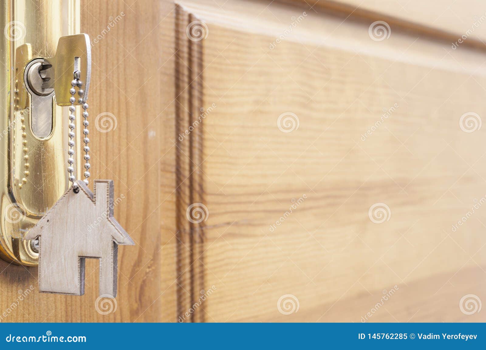 A Key in a Lock with House Icon on it Stock Image - Image of keyring ...