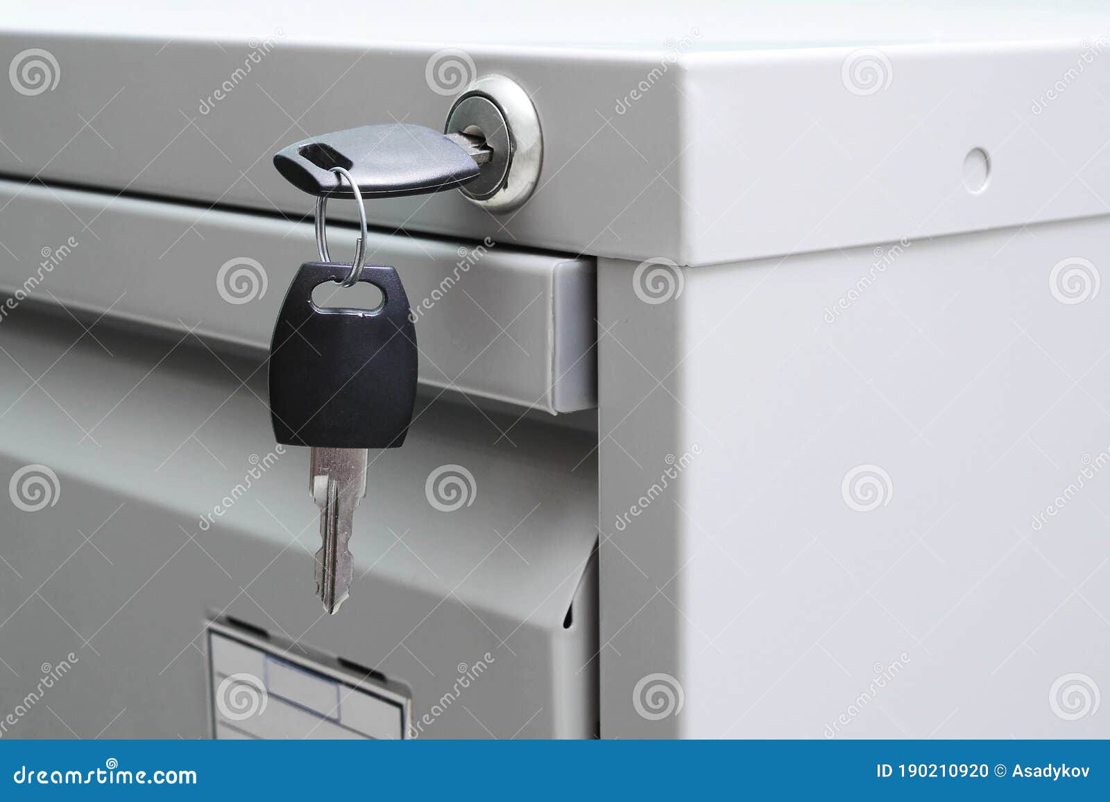 Key in office cabinet lock stock photo. Image of information - 190210920