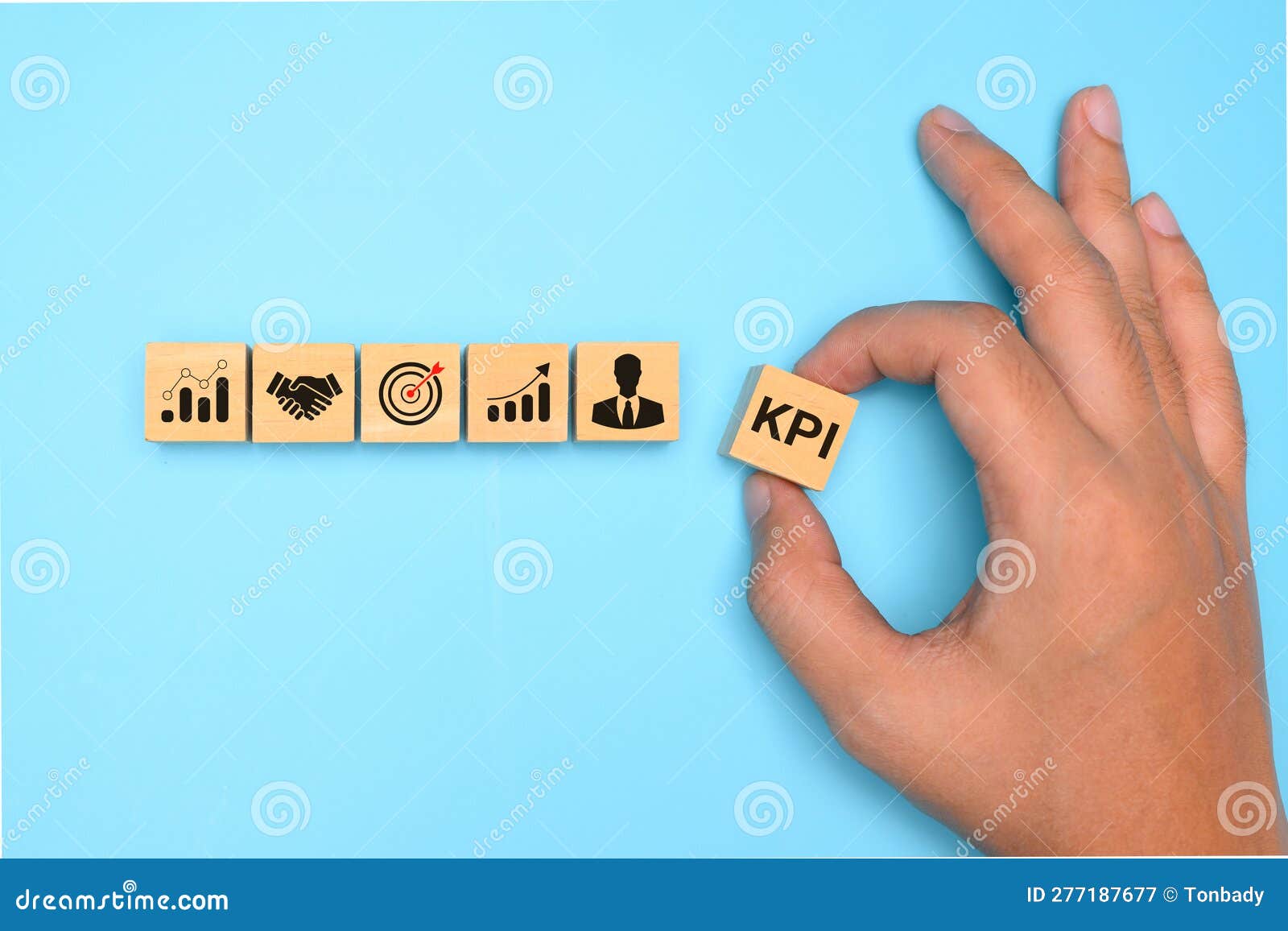 Key Performance Indicator Businessman Holding Wooden Cube With Kpi