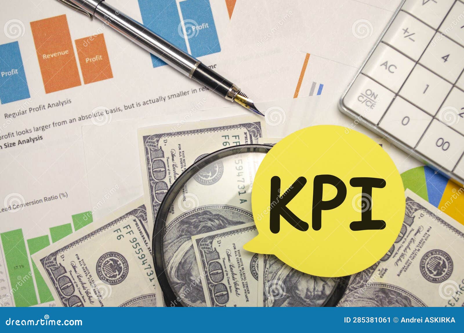KEY PERFORMANCE INDICATOR Words on Yellow Sticker with Dollars with ...