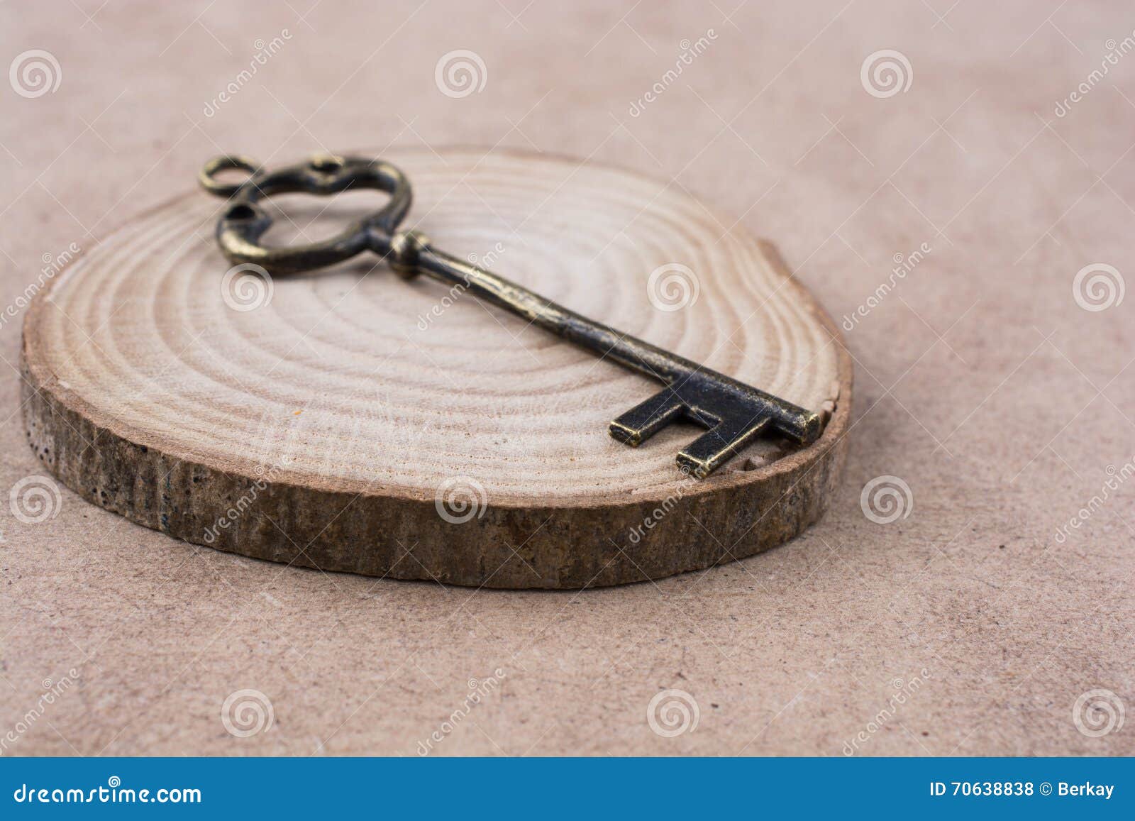 Key on a piece of wood stock photo. Image of security - 70638838