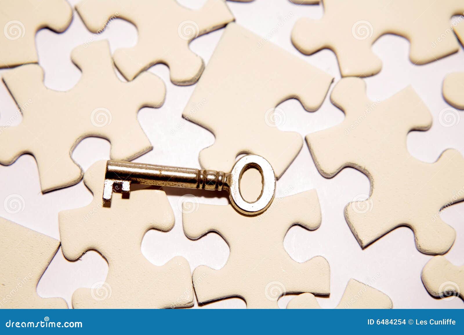 Key and puzzle pieces stock photo. Image of challenging - 6484254