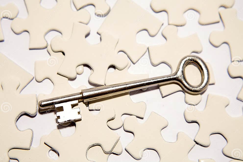 Key on puzzle pieces stock photo. Image of puzzle, answer - 7405192