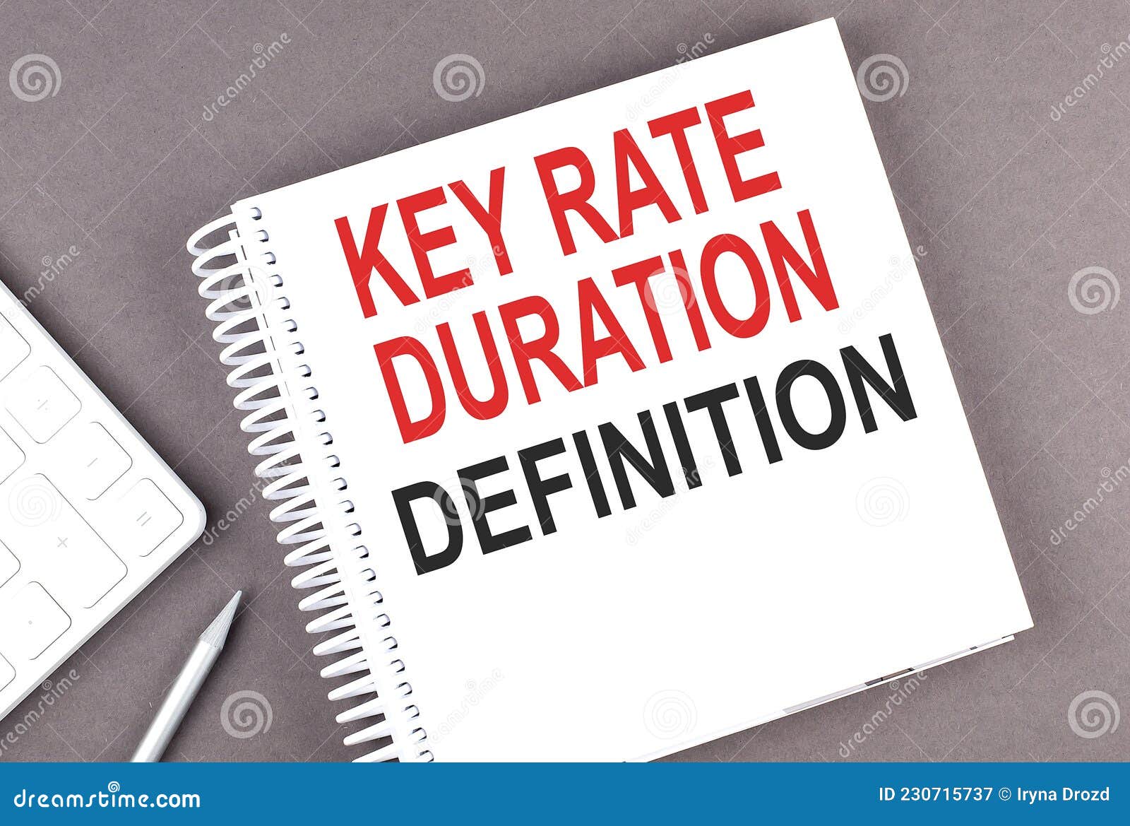 KEY RATE DURATION DEFINITION Text on Notebook with Calculator and Pen ...