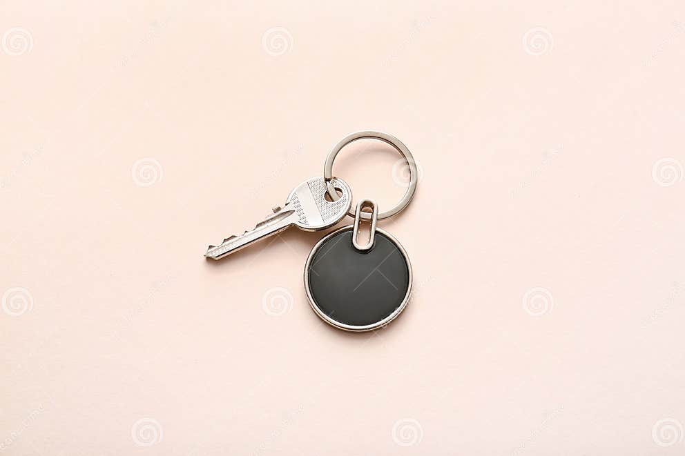 Key with Stylish Keychain on Light Background Stock Photo - Image of ...