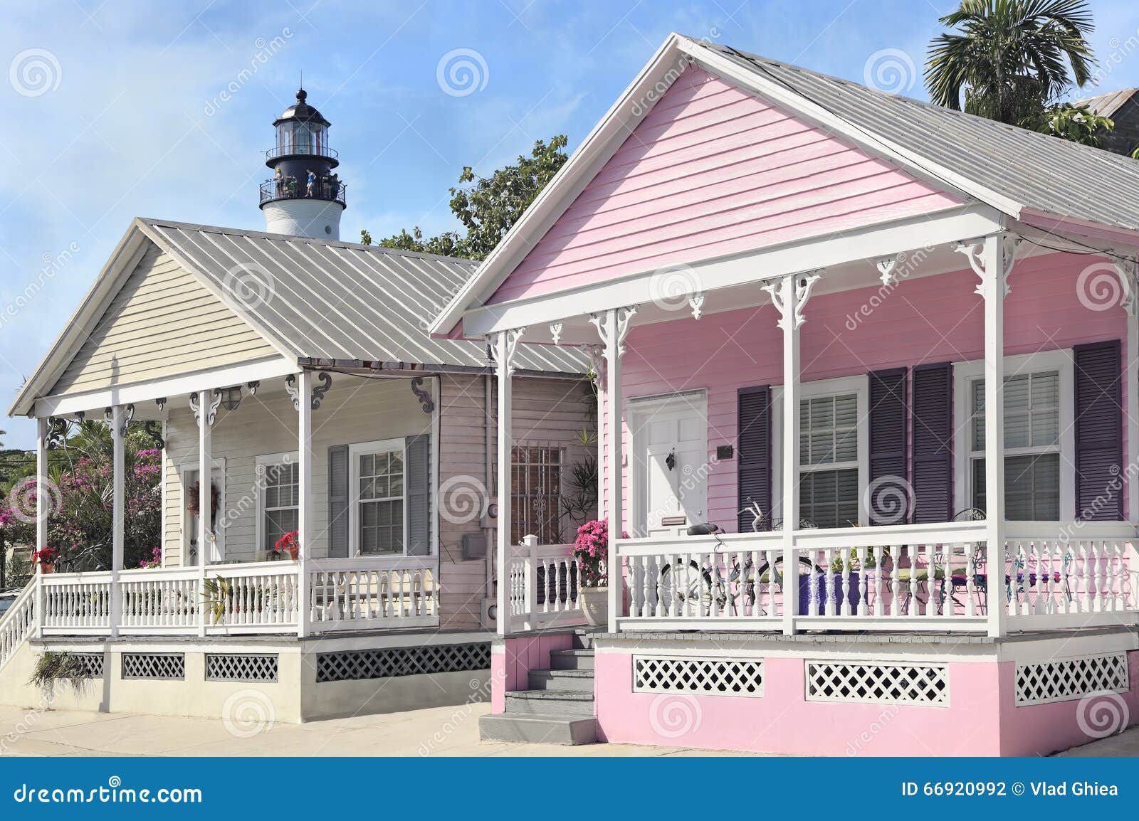 Key West Cottages and Lighthouse, Florida Stock Photo - Image of blue ...