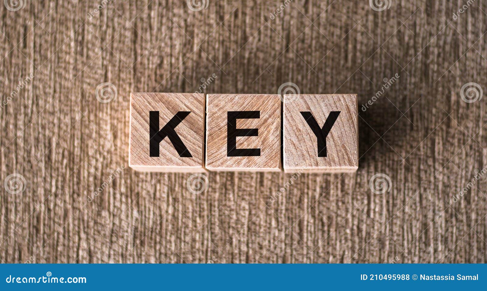 KEY. Word Written on Wooden Blocks on a Brown Background Stock Photo ...