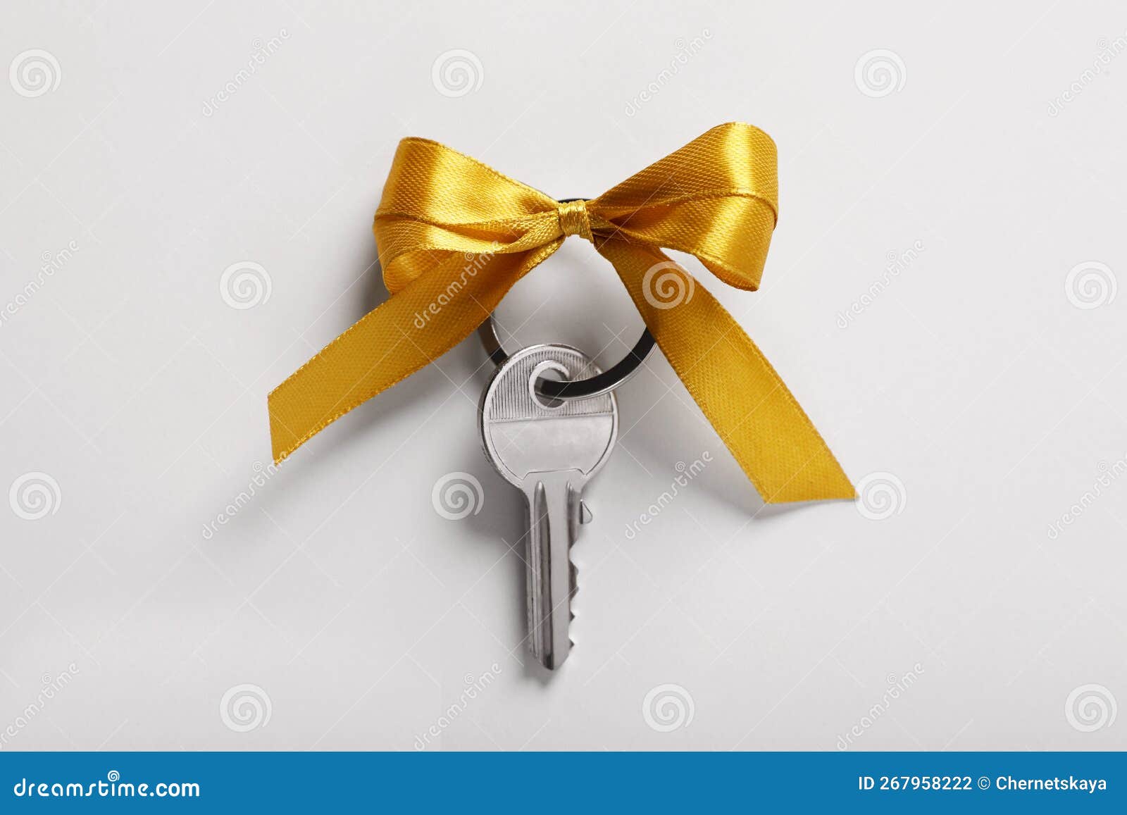Key with Yellow Bow on Light Grey Background, Top View. Housewarming ...