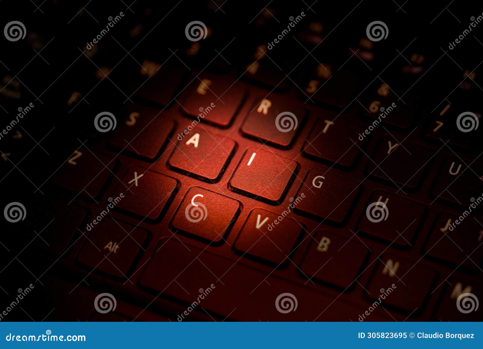 Keyboard Being Illuminated with Red Light Highlighting Letters a I ...