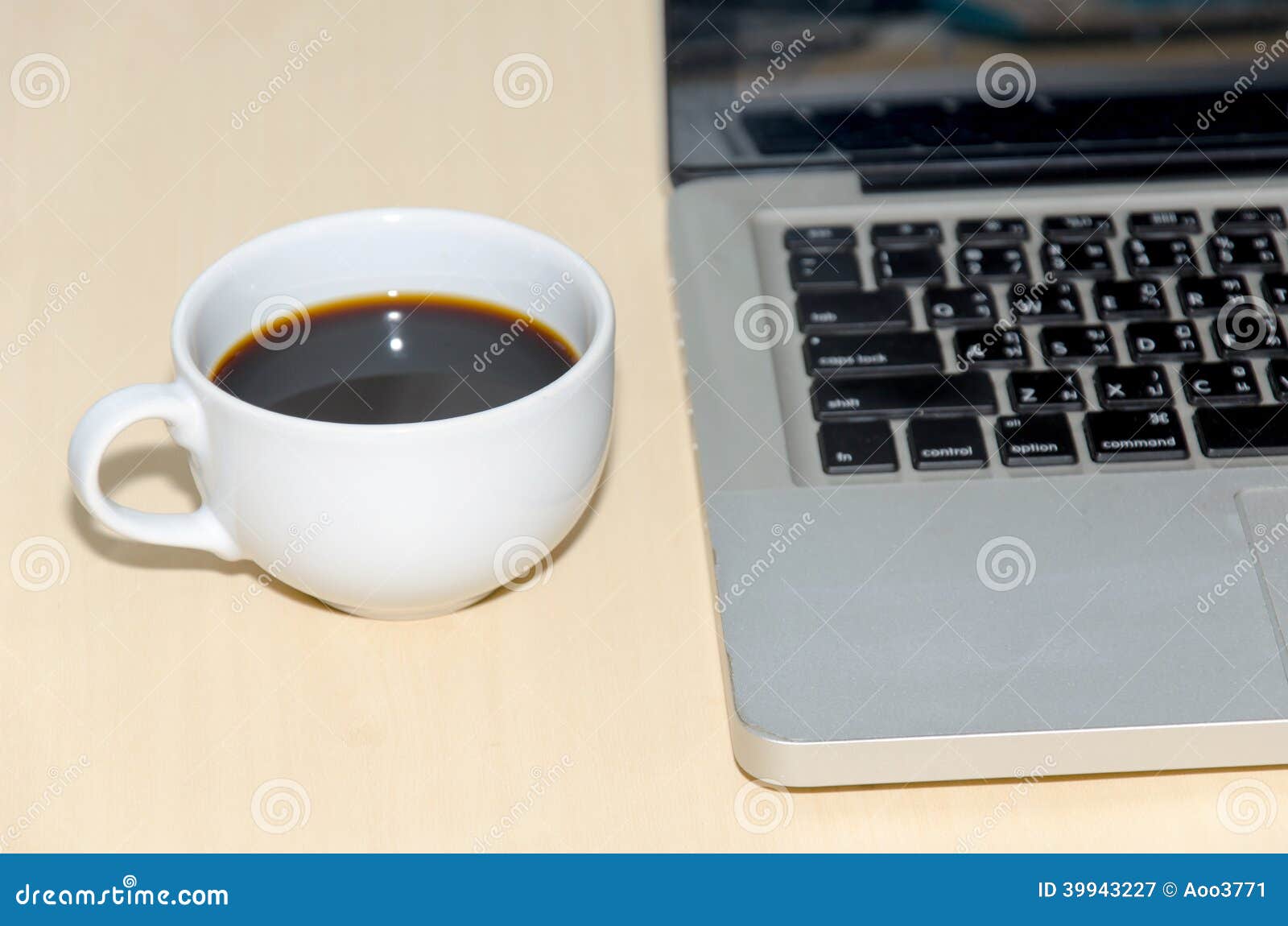 Keyboard and coffee editorial photography. Image of table - 39943227