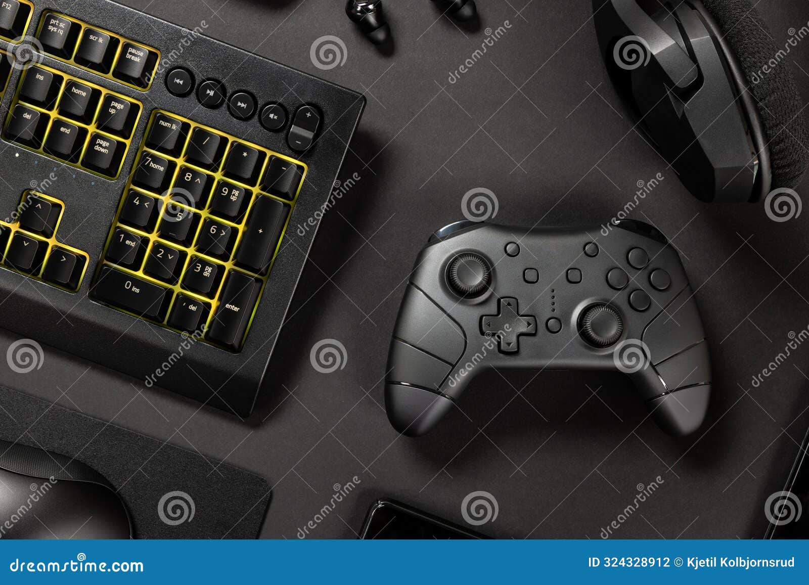 Keyboard and Game Controller Amidst Various Wireless Devices Stock ...