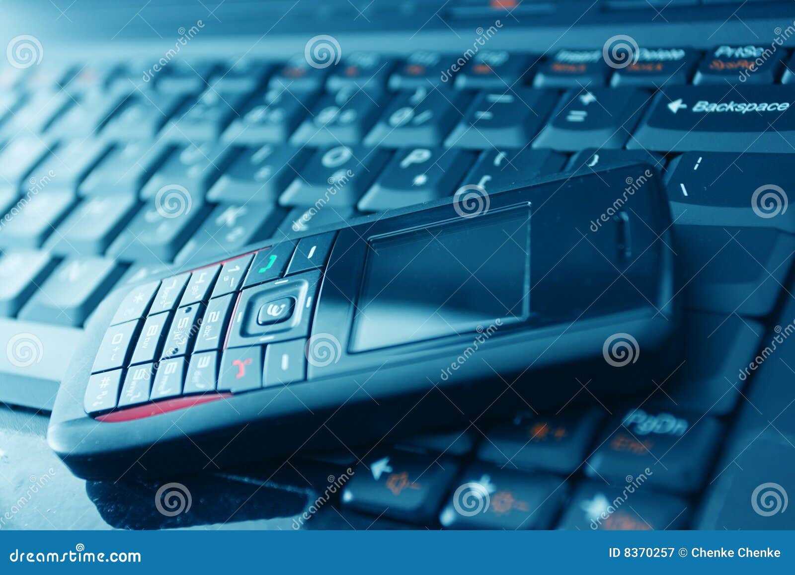 Keyboard with a Mobile Phone Stock Image - Image of cable, business ...