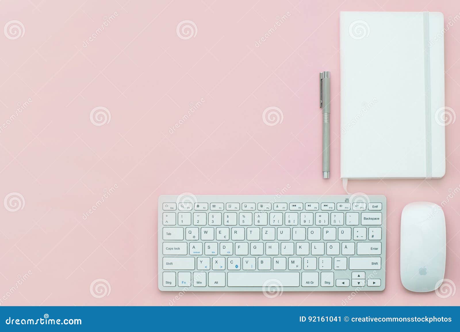 Keyboard And Mouse On Pink With Notepad Picture. Image: 92161041