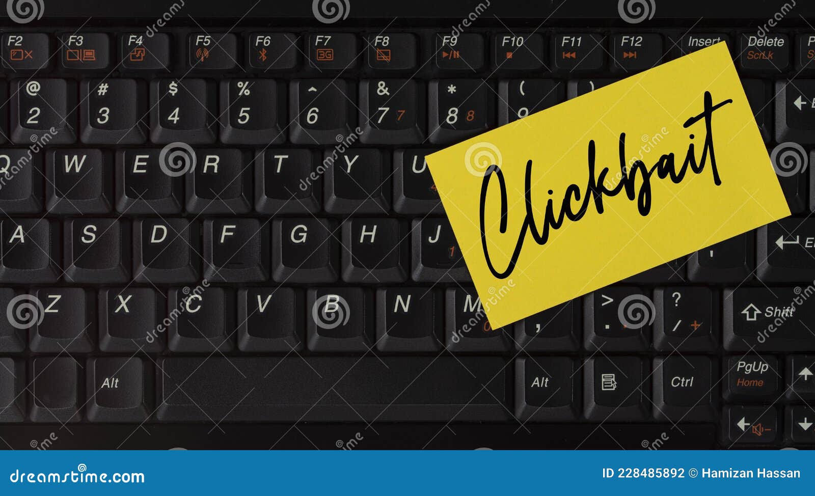 A Keyboard with a Note and Text Clickbait Stock Photo - Image of intent ...