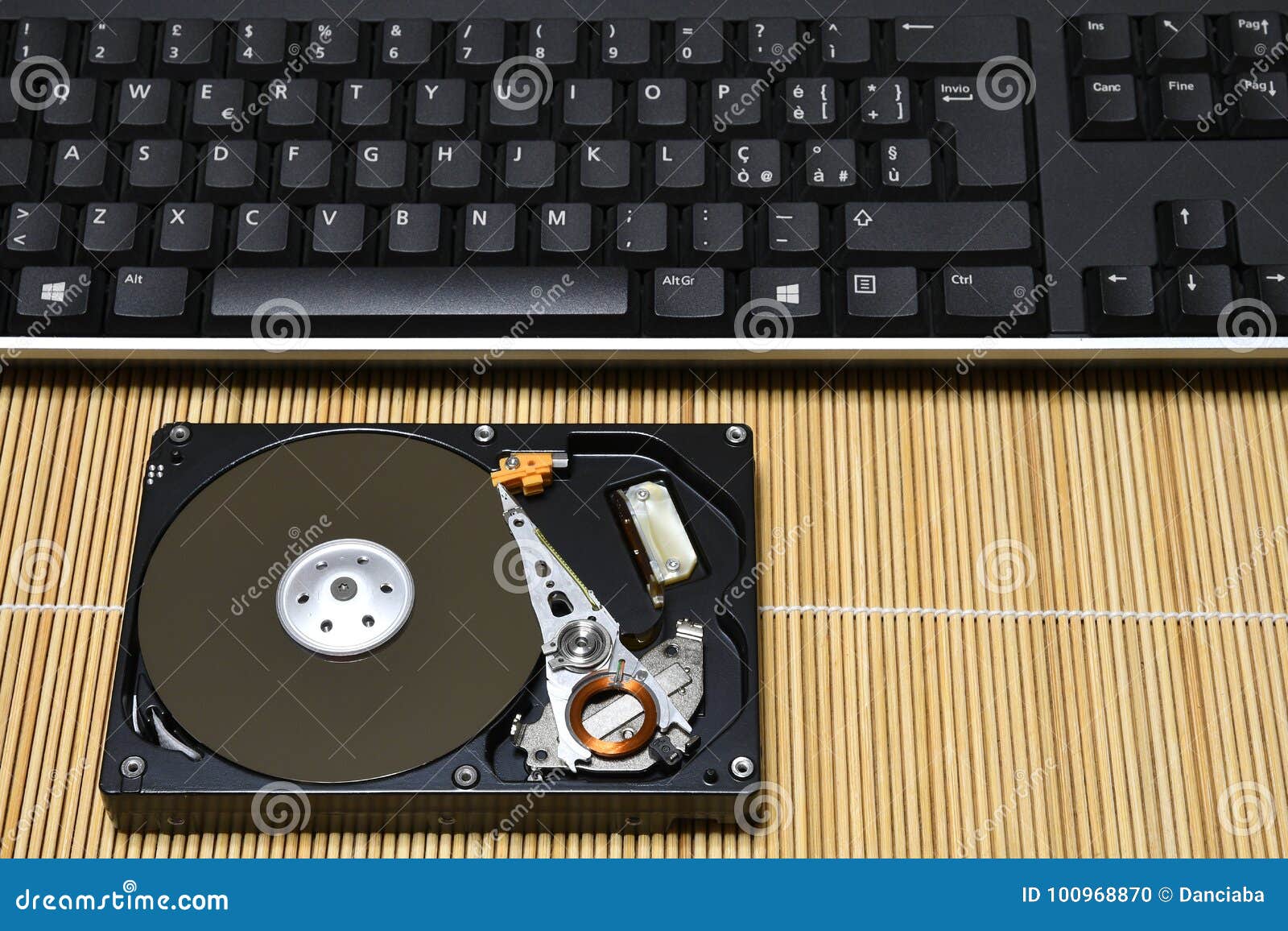 Keyboard and Open Hard Disk Drive on Wood Background Editorial Image ...