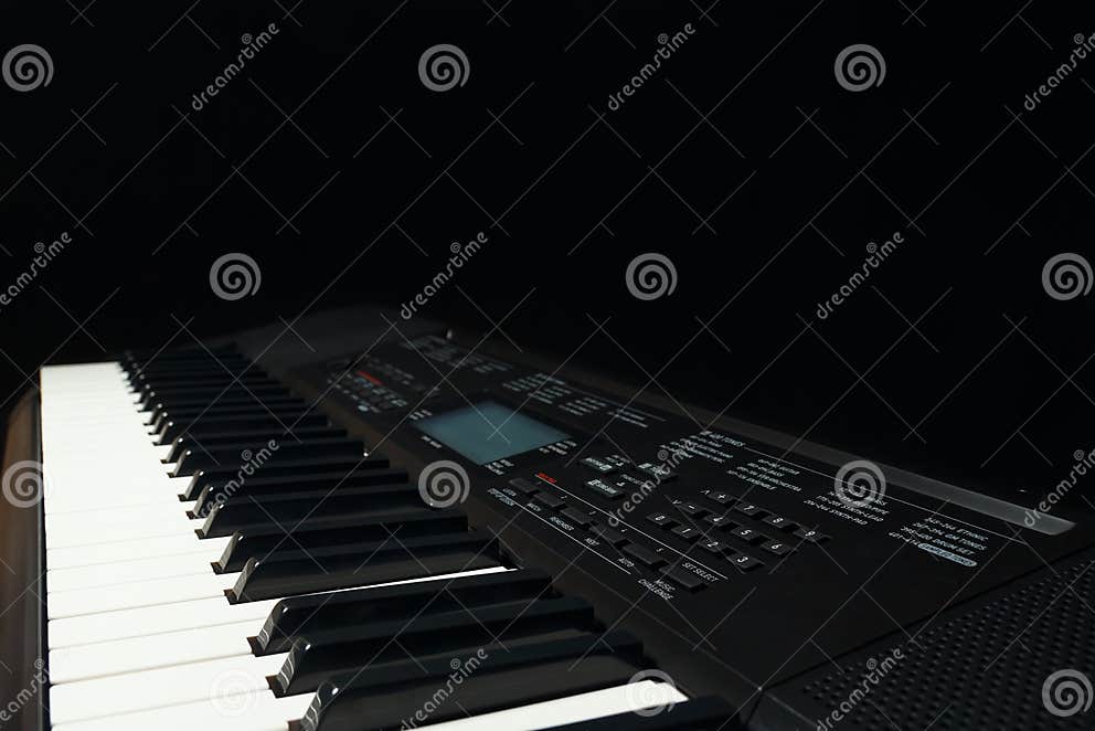 Keyboard of the Synth on Black Background Stock Image - Image of ...