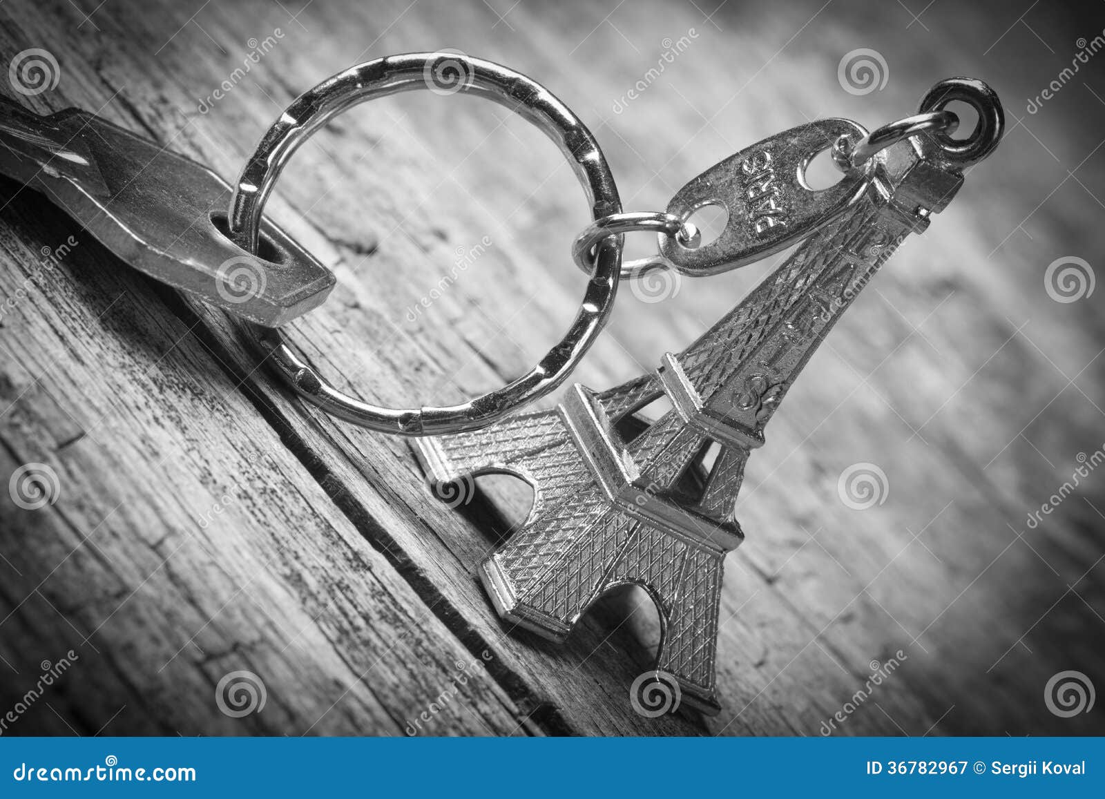Keychain in the Shape of the Eiffel Tower with Key Closeup. Stock Image ...