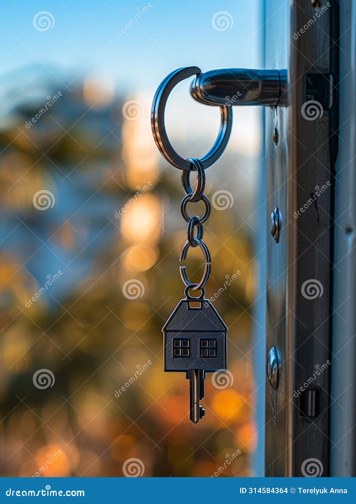 Keychain in the Shape of House. a House Shaped Keychain Hanging from a ...