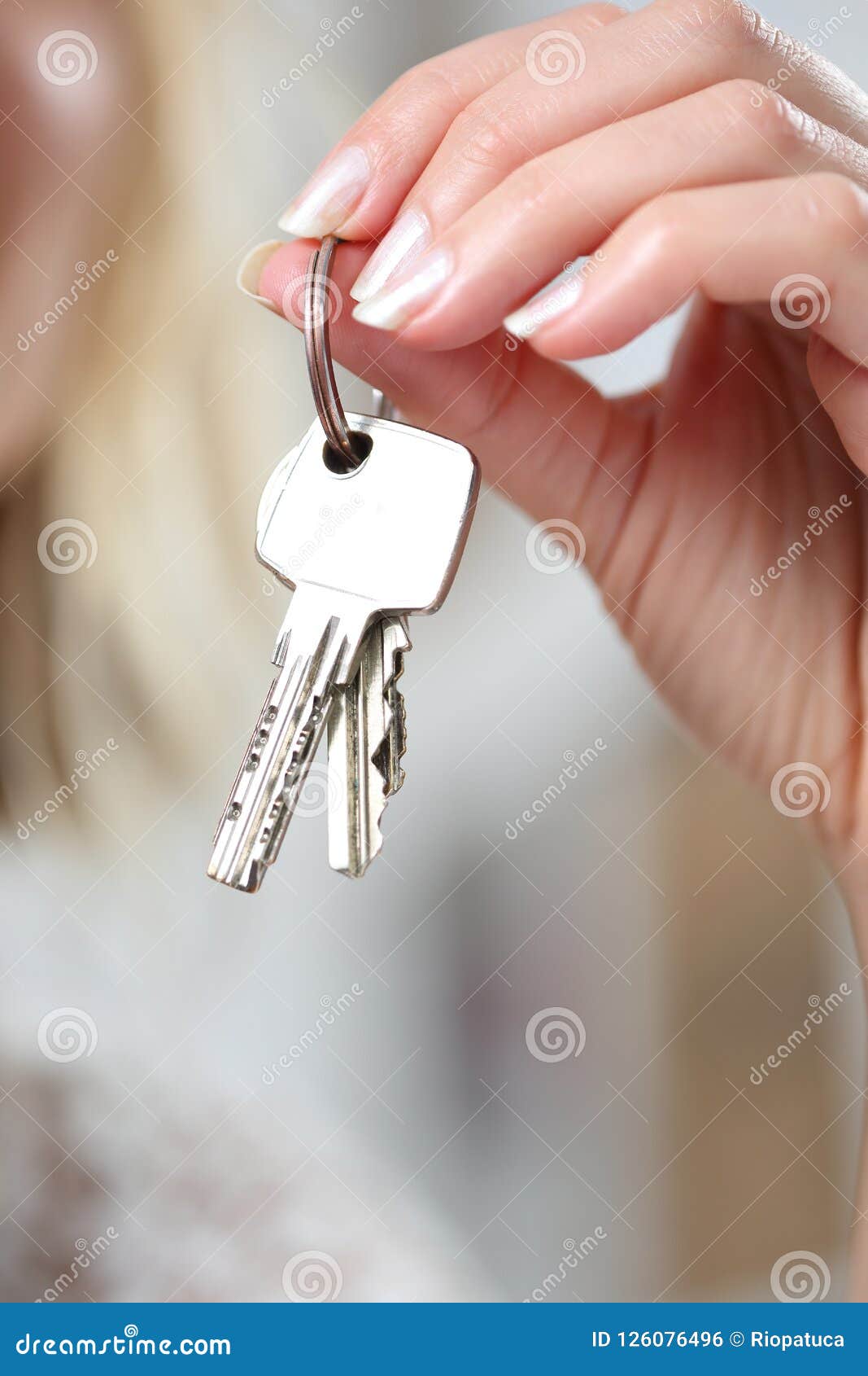 Keychain with Various Keys in a Womans Hand Stock Photo - Image of ...
