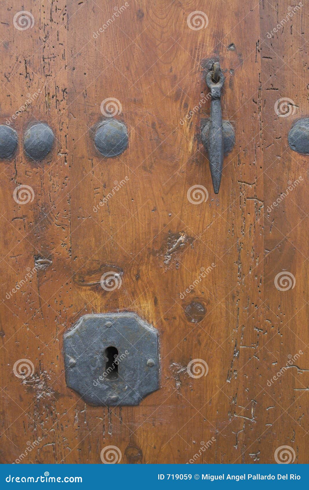 Keyhole in a rustic door. stock image. Image of lumber - 719059