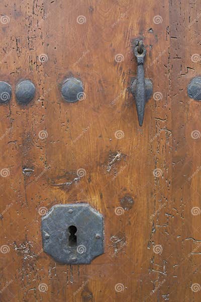 Keyhole in a rustic door. stock image. Image of lumber - 719059