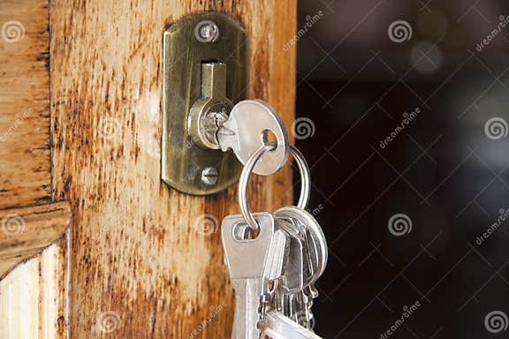 Keys at the front door stock photo. Image of wooden, metal - 21208416