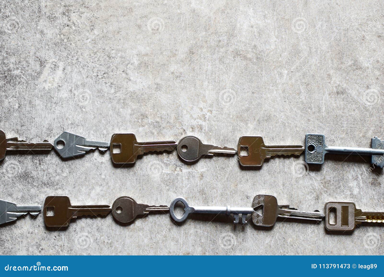 Keys on Grey Grunge Table Background Stock Image - Image of iron ...