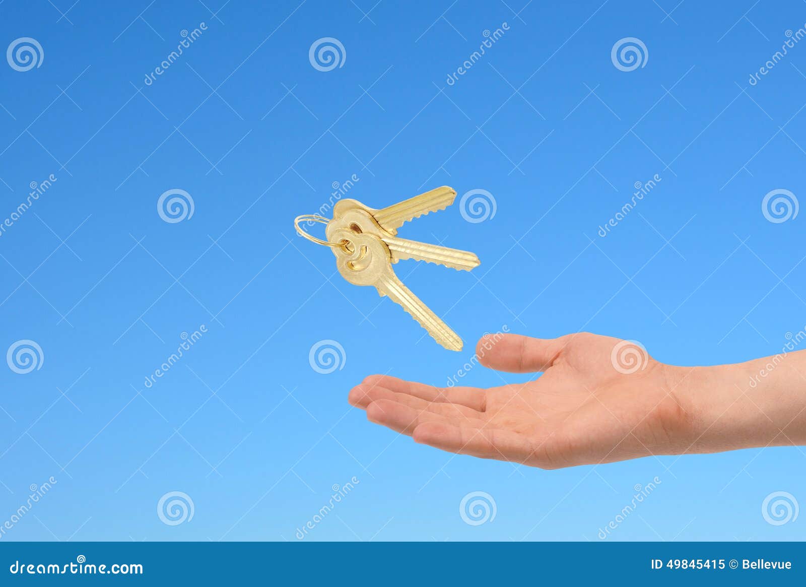 Keys in Hand Over Sky Background. Stock Image - Image of palm ...