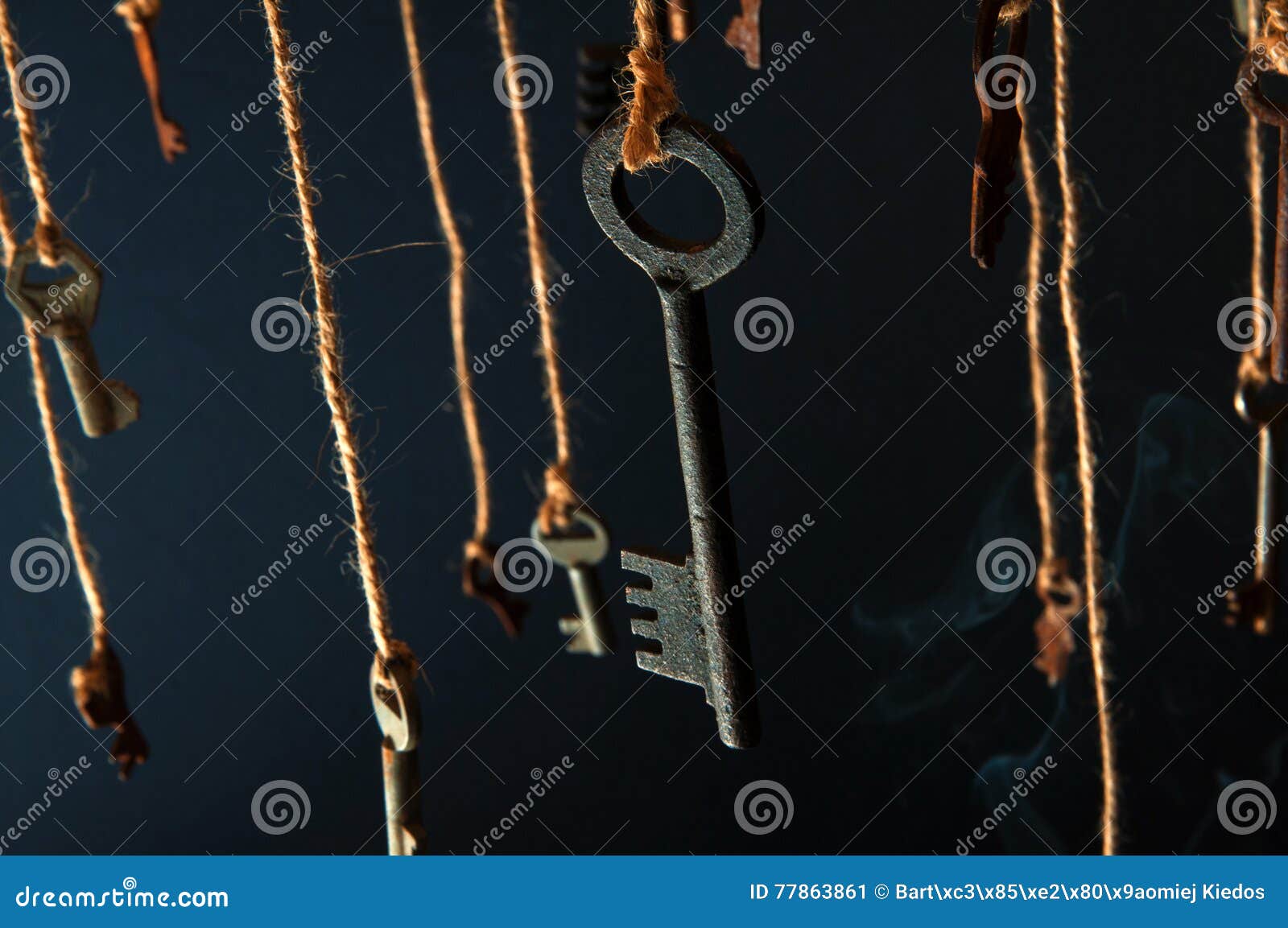 Keys Hanging on a String. Smoke Background. Selective Focus Stock Image ...