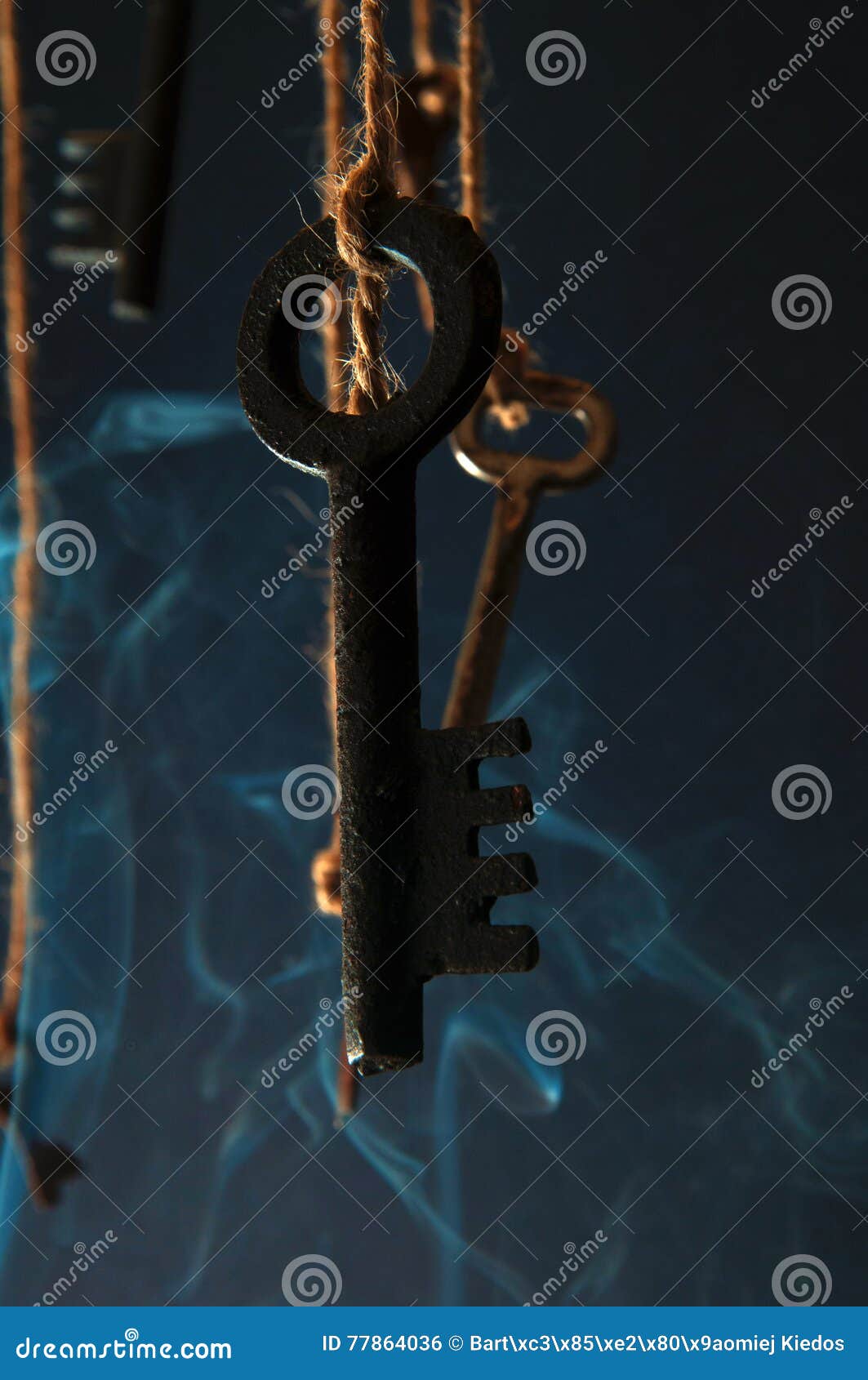 Keys Hanging on a String. Smoke Background Stock Photo - Image of rope ...