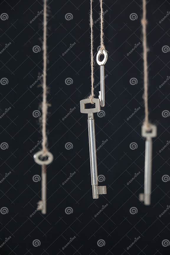 Keys hanging on strings stock photo. Image of real, house - 84069252