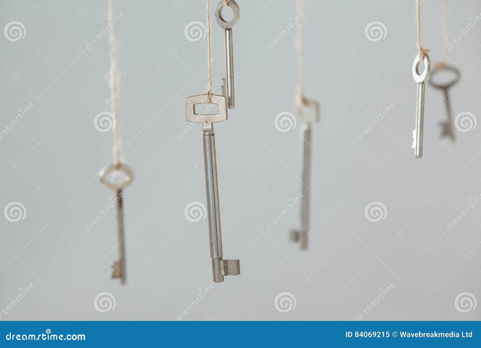 Keys hanging on strings stock image. Image of steel, security - 84069215