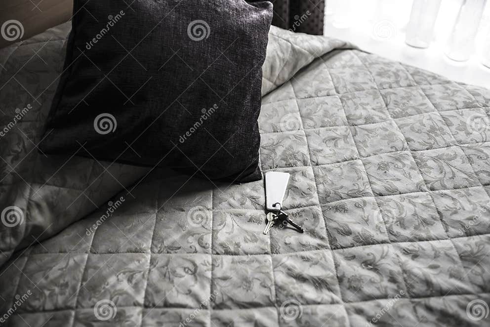 Keys on a hotel bed stock photo. Image of keycard, open - 110711008