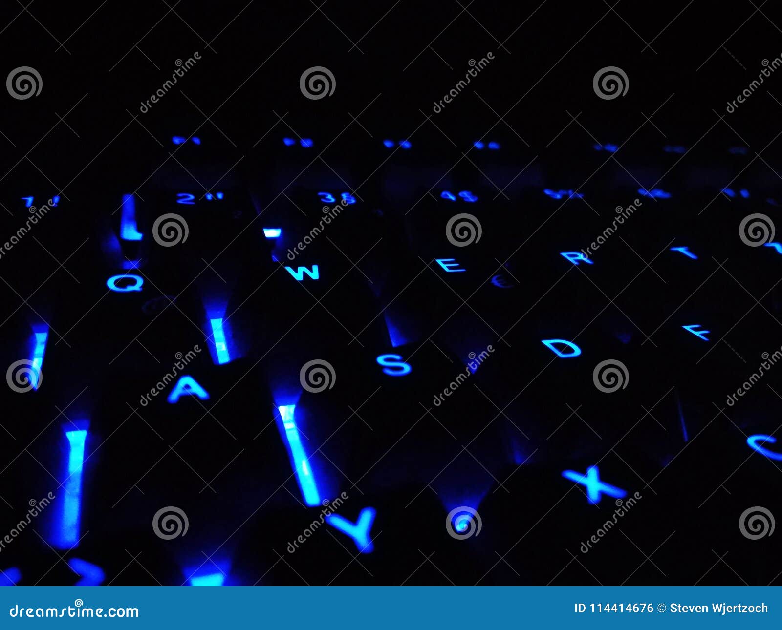 Keys of a Keyboard with German Layout and Blue Background Color Viewed ...