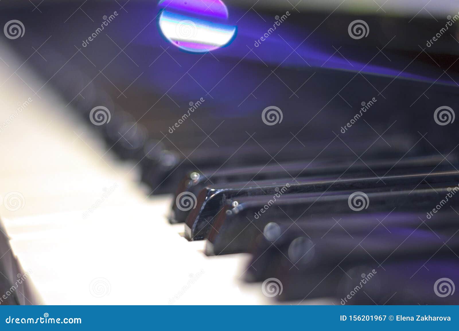 Keys on the Piano in the Light of Neon Lights. Macro. Close-up. Blur ...