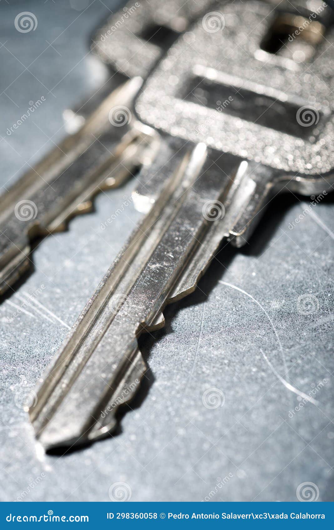 Keys on a Scratched Metal Surface Stock Photo - Image of normal ...