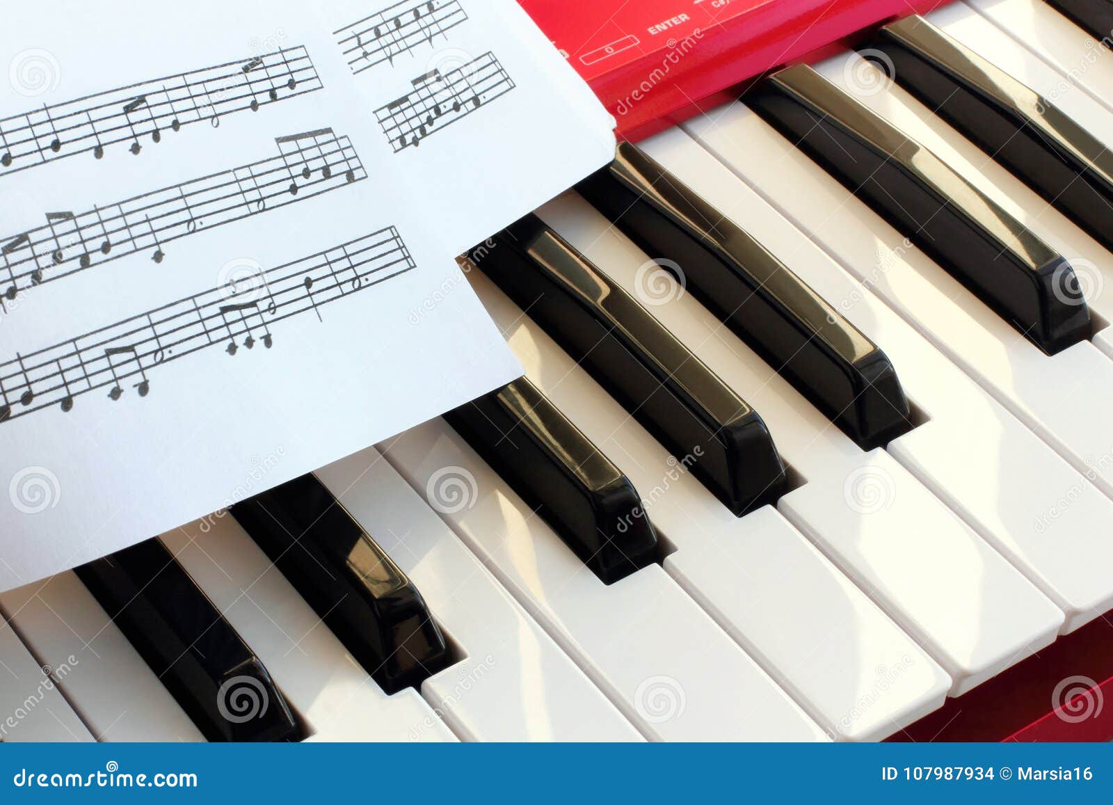 Keys of the Synthesizer with Sheet Music Stock Photo - Image of ...
