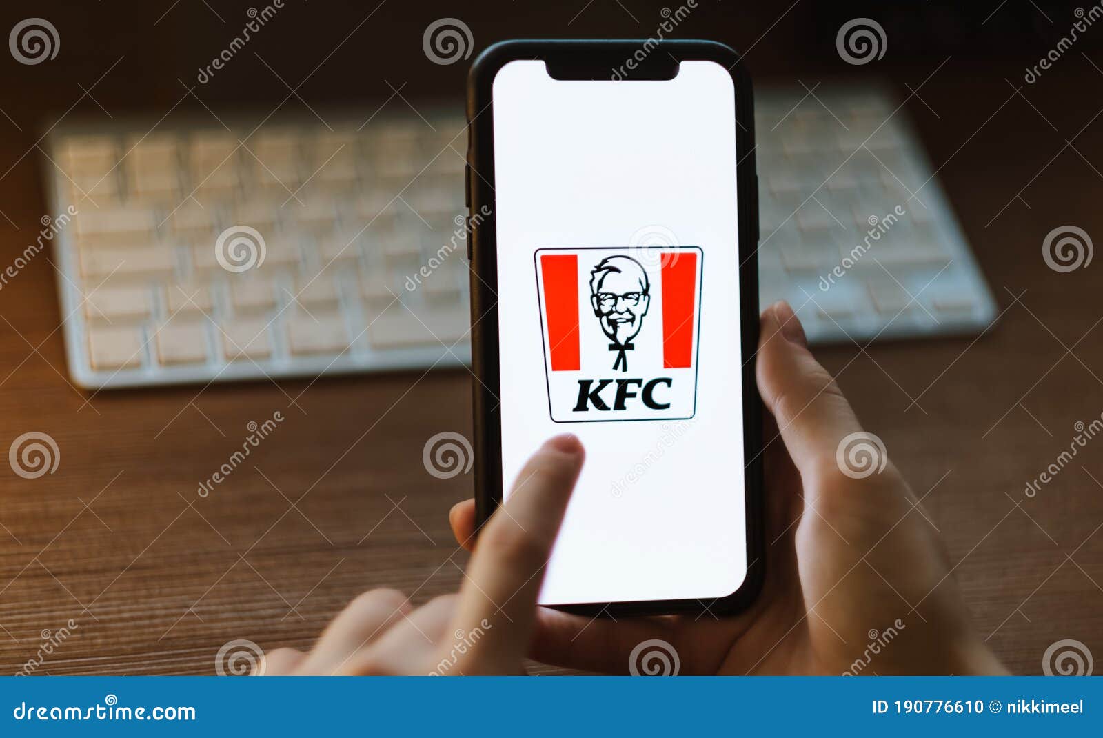 KFC Logo on the Smartphone Screen in Hand Editorial Image - Image of ...