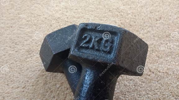 2kg weights on floor stock image. Image of black, metal - 98579019