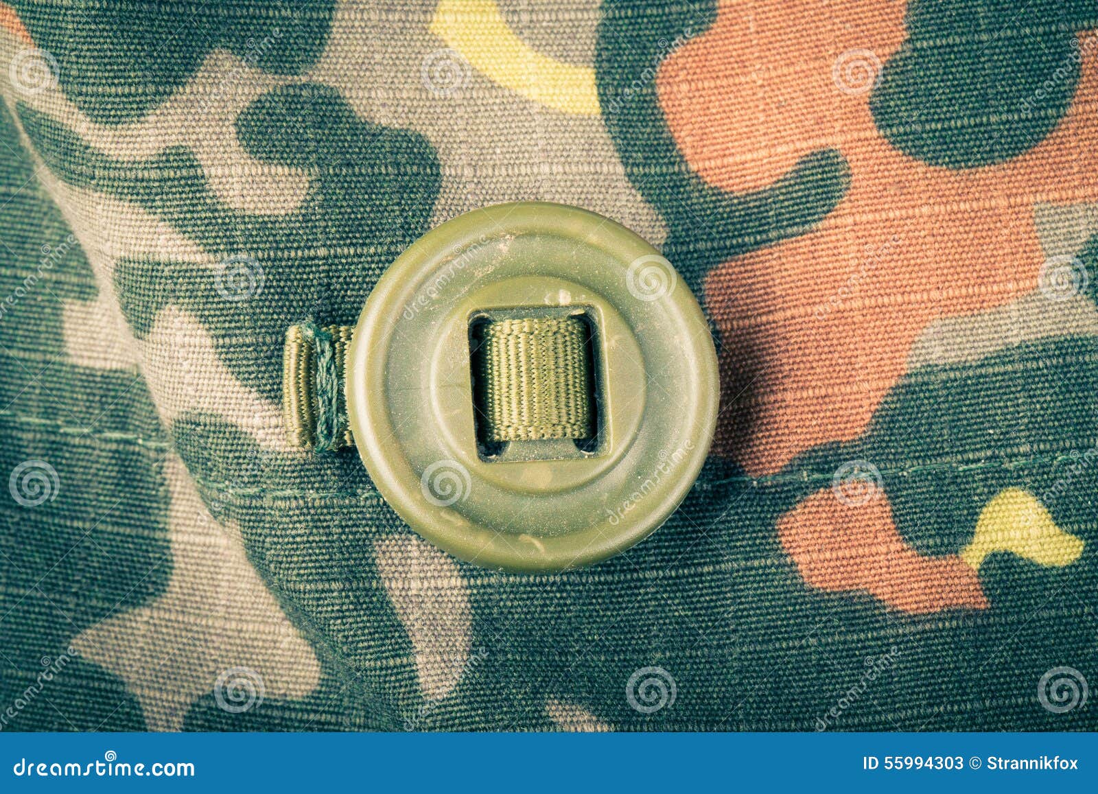 Khaki Button on the Fabric with a Camouflage Pattern. Background Stock ...